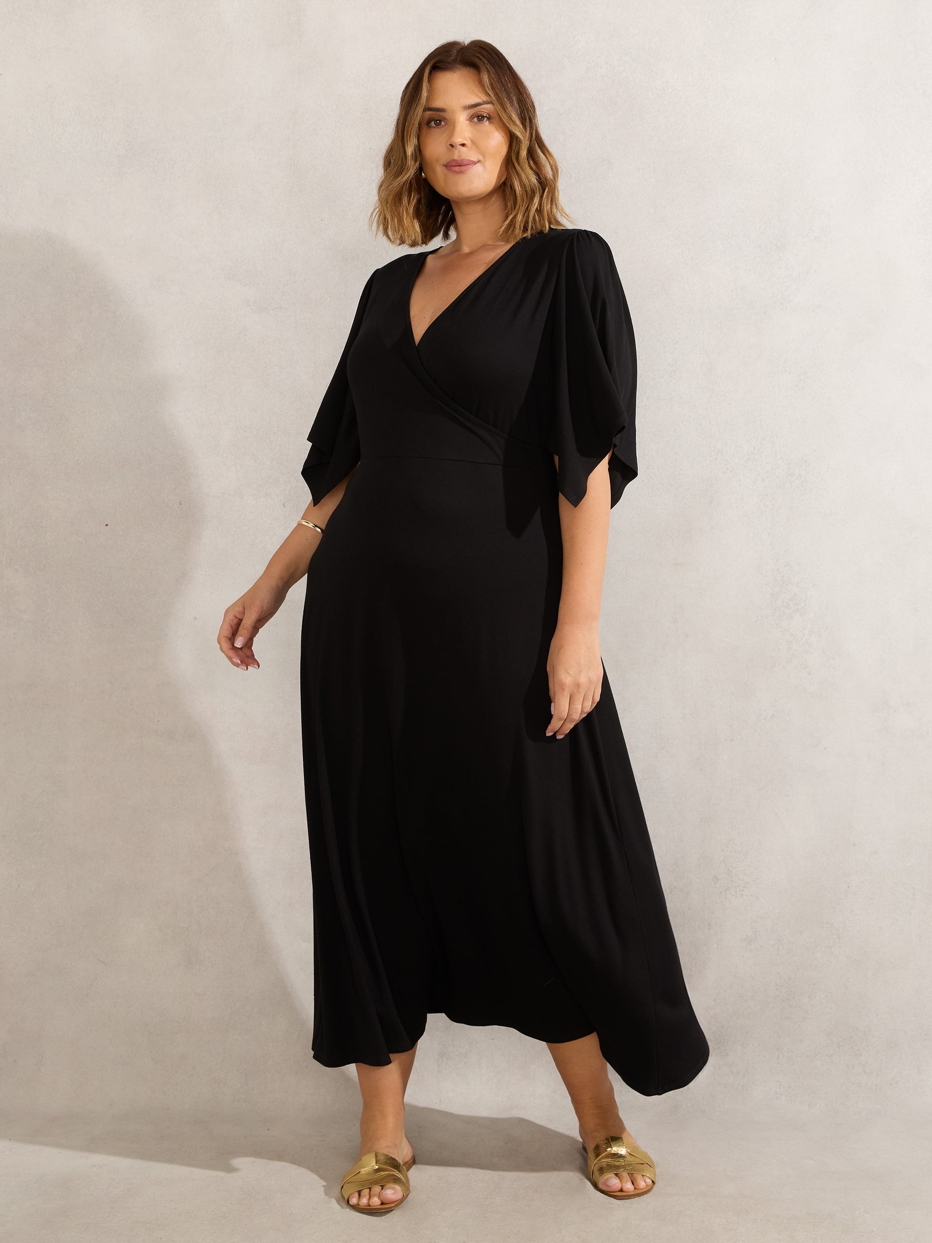 Black Jersey Angel Sleeve Wrap Dress